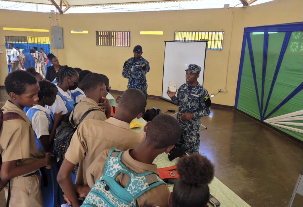 ENGAGING OUR YOUTH! Members of the First District Jamaica Defence Force ...
